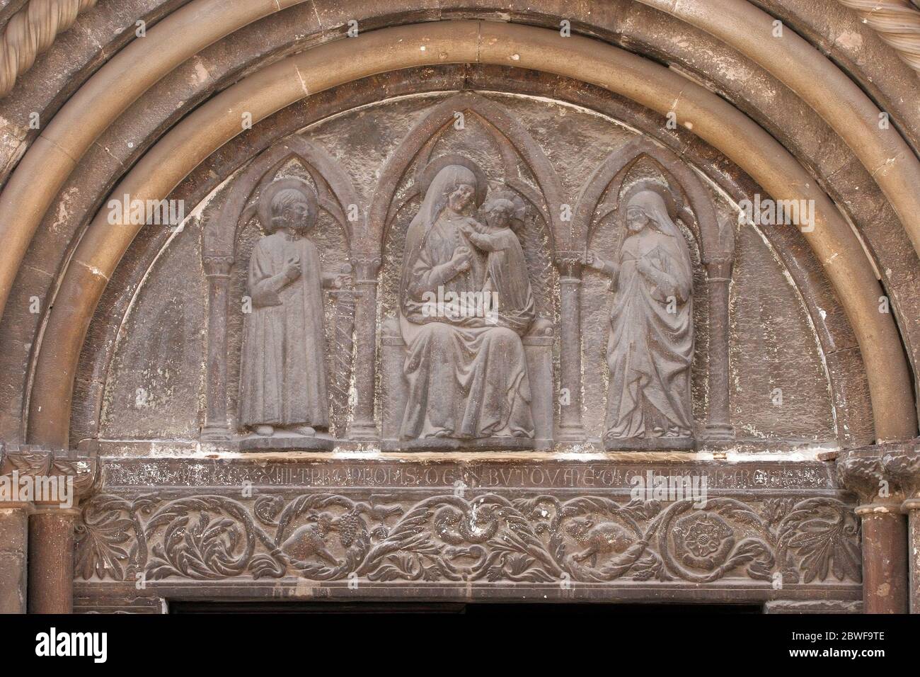 Gothic relief of the Virgin and Child, on the right is St Anastasia ...