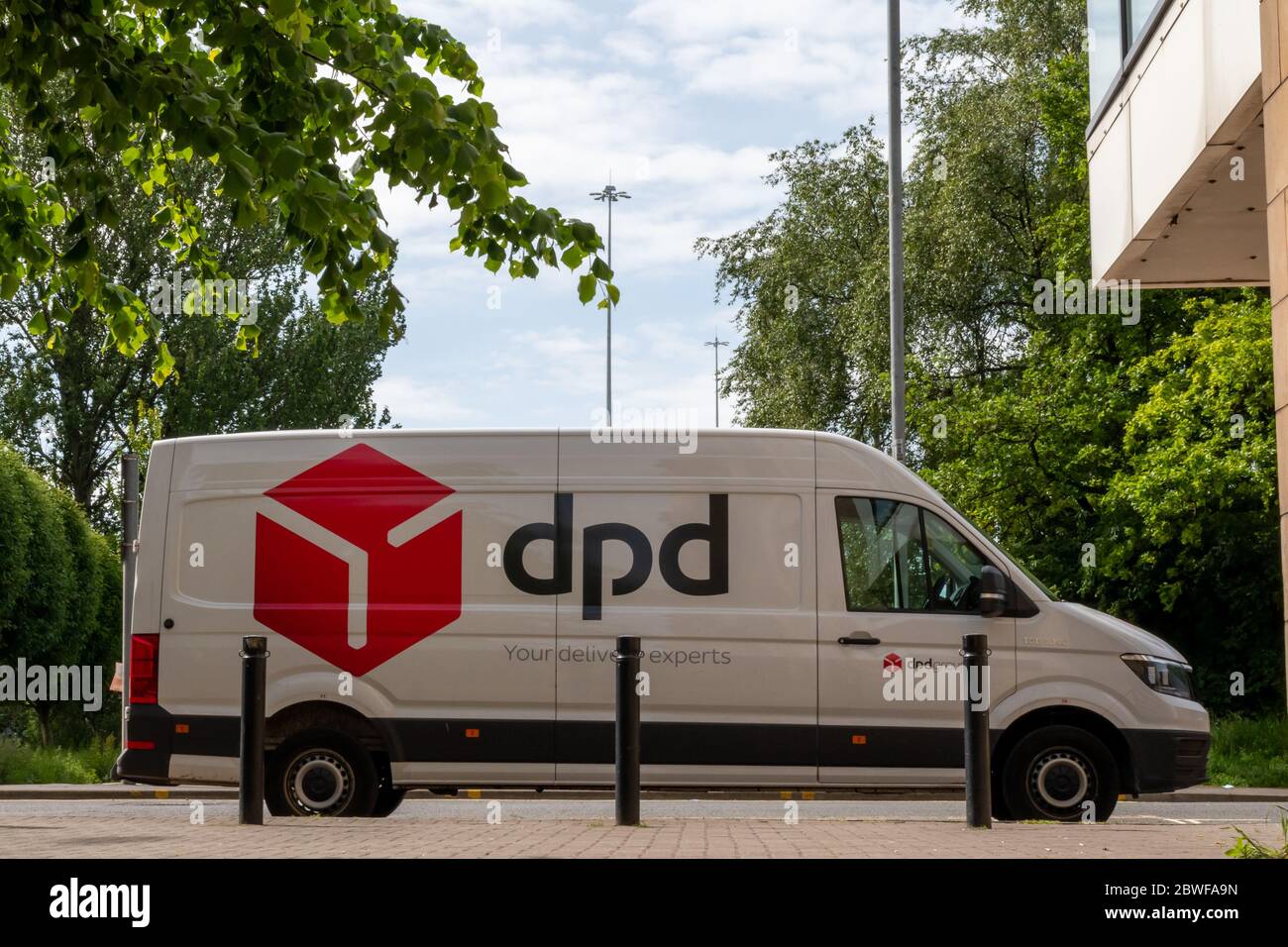 DPD Delivery van out and about making deliveries on a hot summer day ...