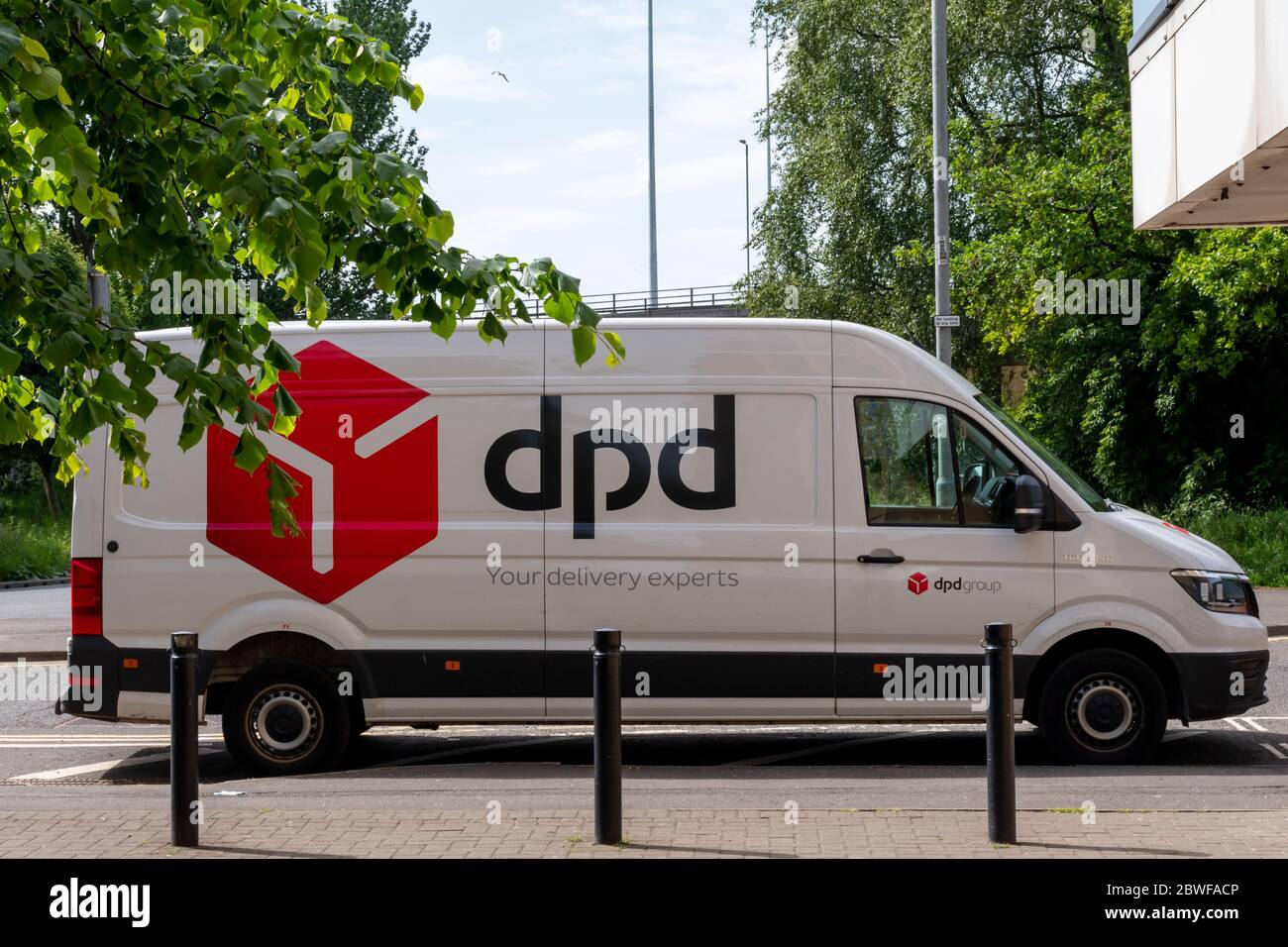 DPD Delivery van out and about making deliveries on a hot summer day ...