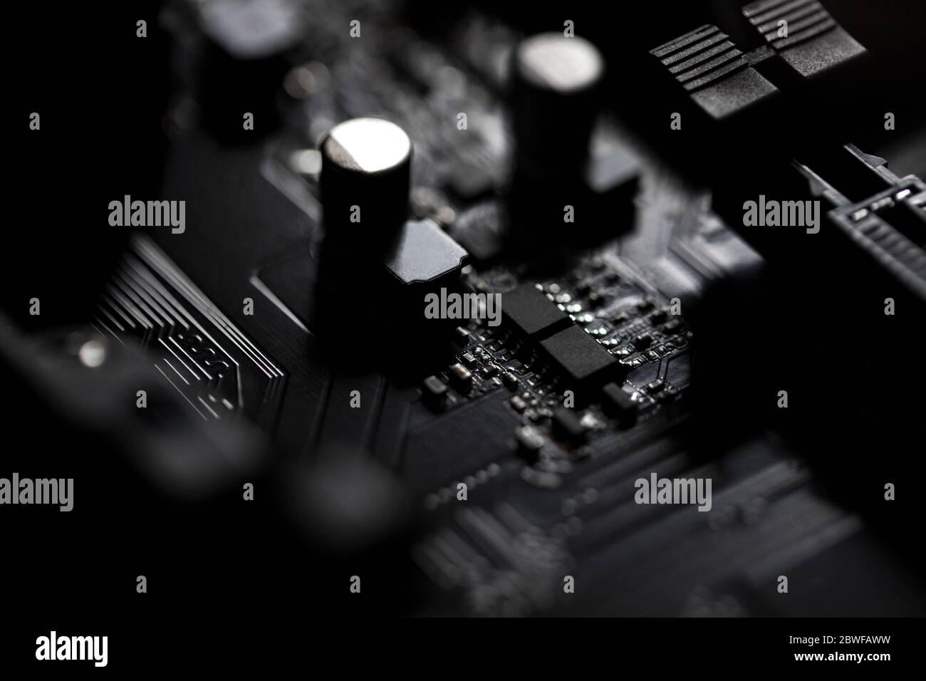 modern black computer chips on an mainboard Stock Photo - Alamy