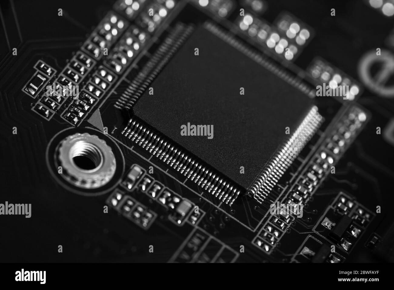 modern black computer chips on an mainboard Stock Photo - Alamy