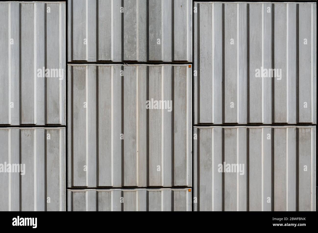 A close up crop of stacked concrete cinder blocks used in construction ...