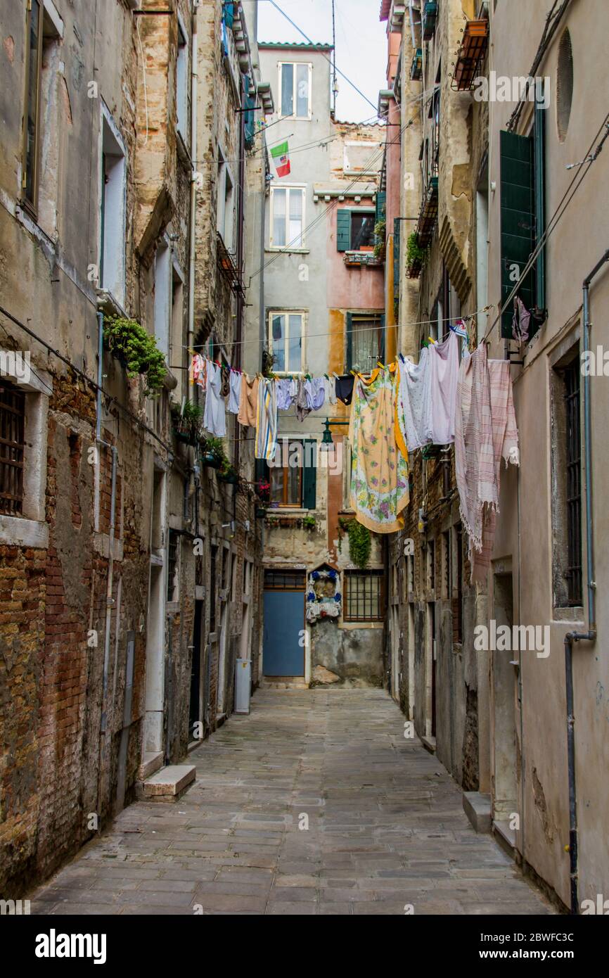 Hanging street clothesline hi-res stock photography and images - Alamy