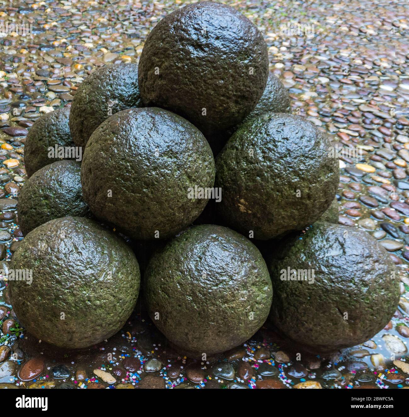 Old stone cannon balls in the coutyard of Castle Estense, Ferrara Stock ...