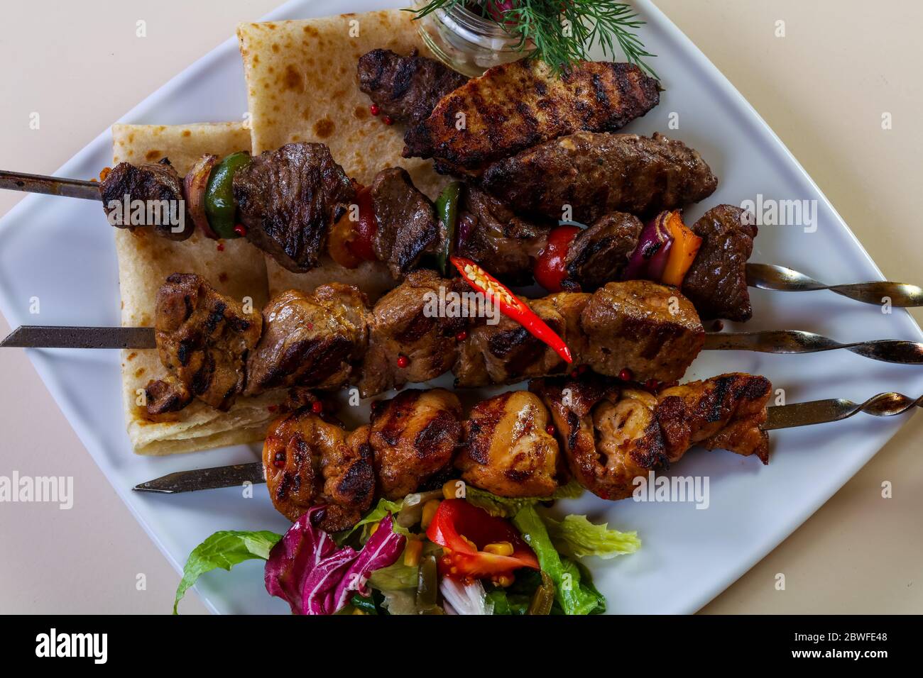 Barbeque meat mix plate with vegetalbes Stock Photo - Alamy