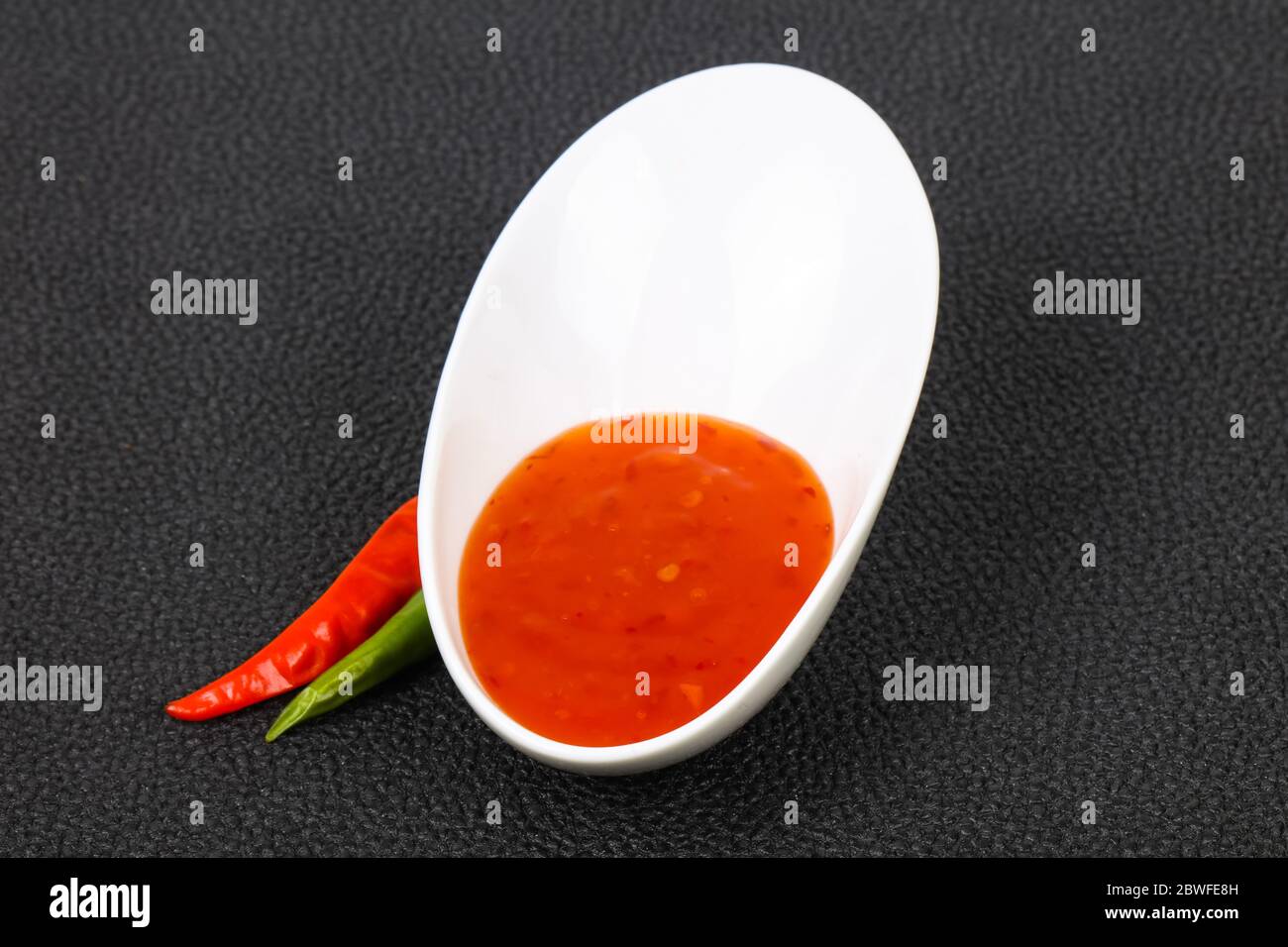 Sweet and spicy chilli sauce in the bowl Stock Photo - Alamy