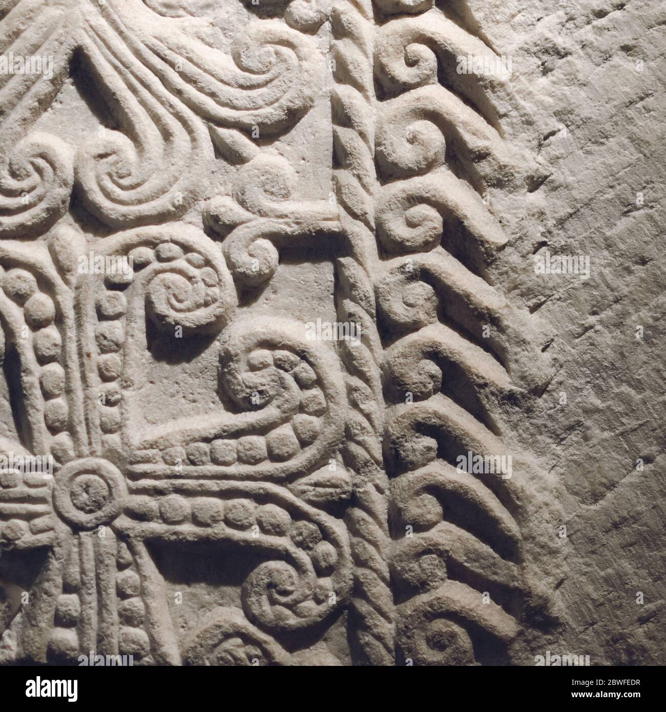 Romanesque decorations carved in the stone wall of an ancient medieval ...