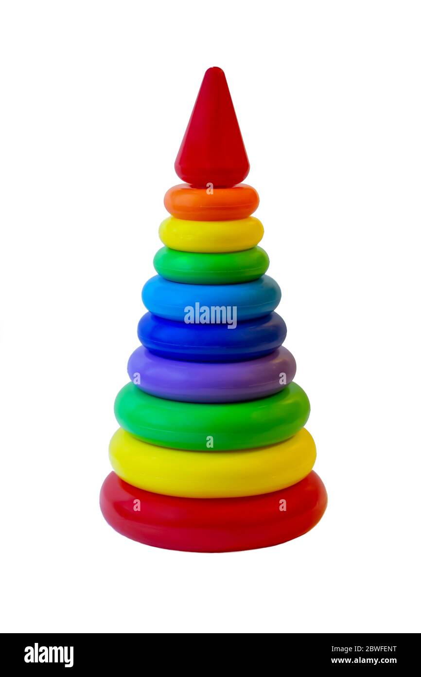 Children's plastic toy pyramid in a packing grid on a white background ...