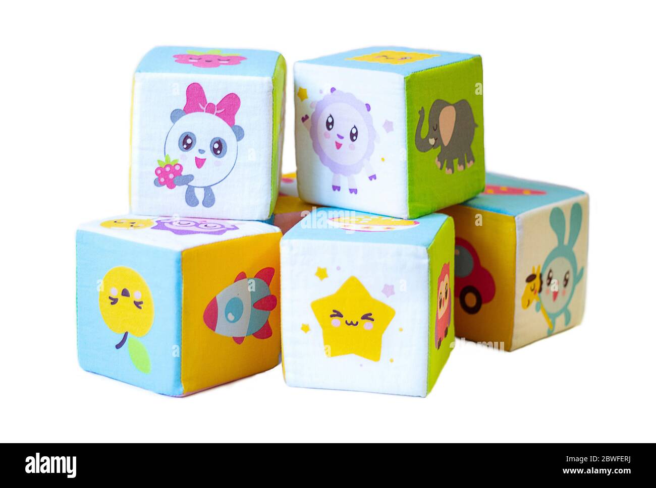 Handful of toy blocks on white background. A small handful of children ...