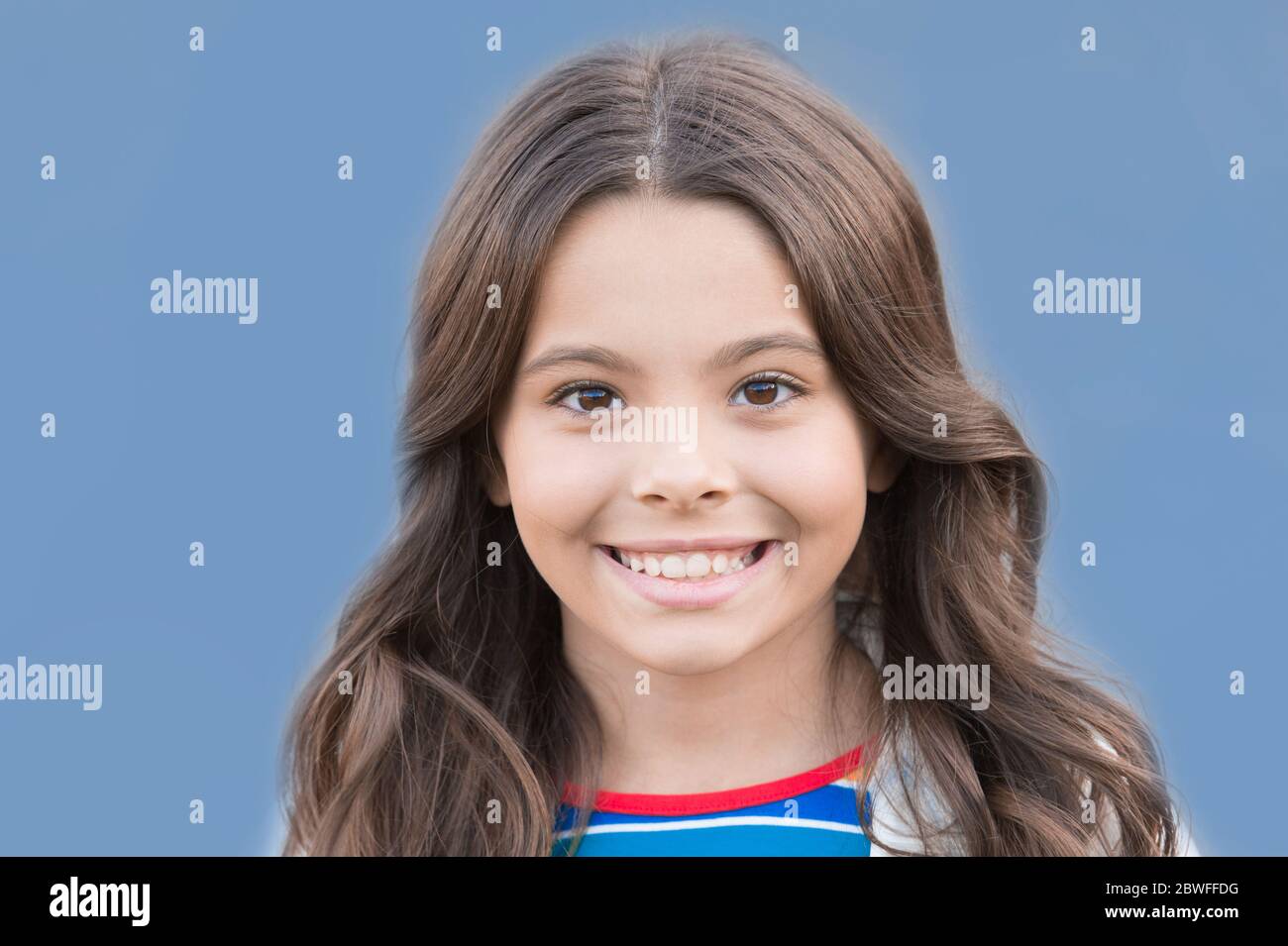 Have a smile on your lips. Happy child smile blue background. Small ...