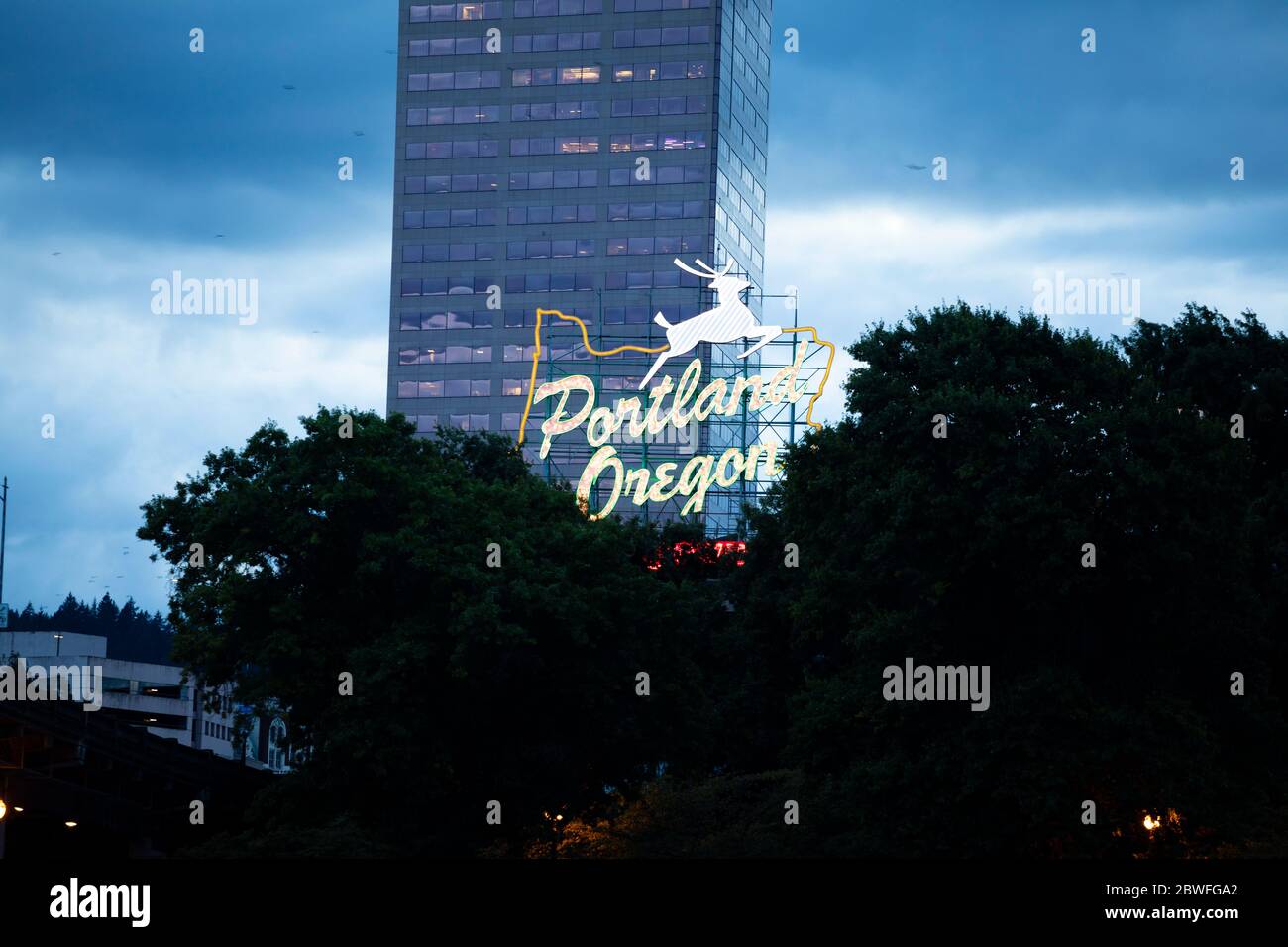 Sign with city name and skyscraper, Portland, Oregon, USA Stock Photo ...