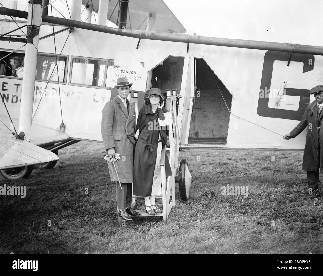 The honeymoon express . Pilot Officer Whinney , RAF , who married Miss ...