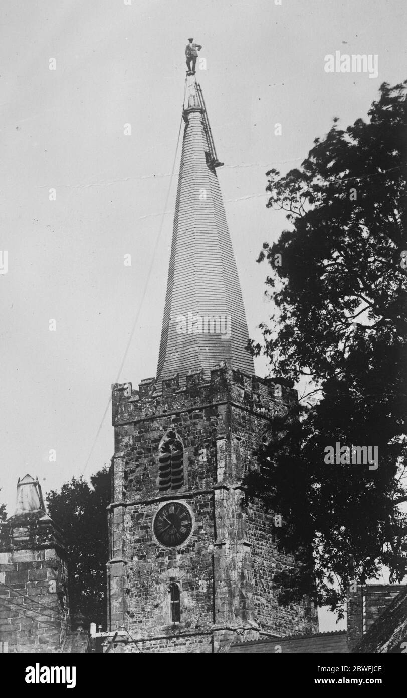 Human Weathercock . Ager the London steeplejack balancing himself on ...