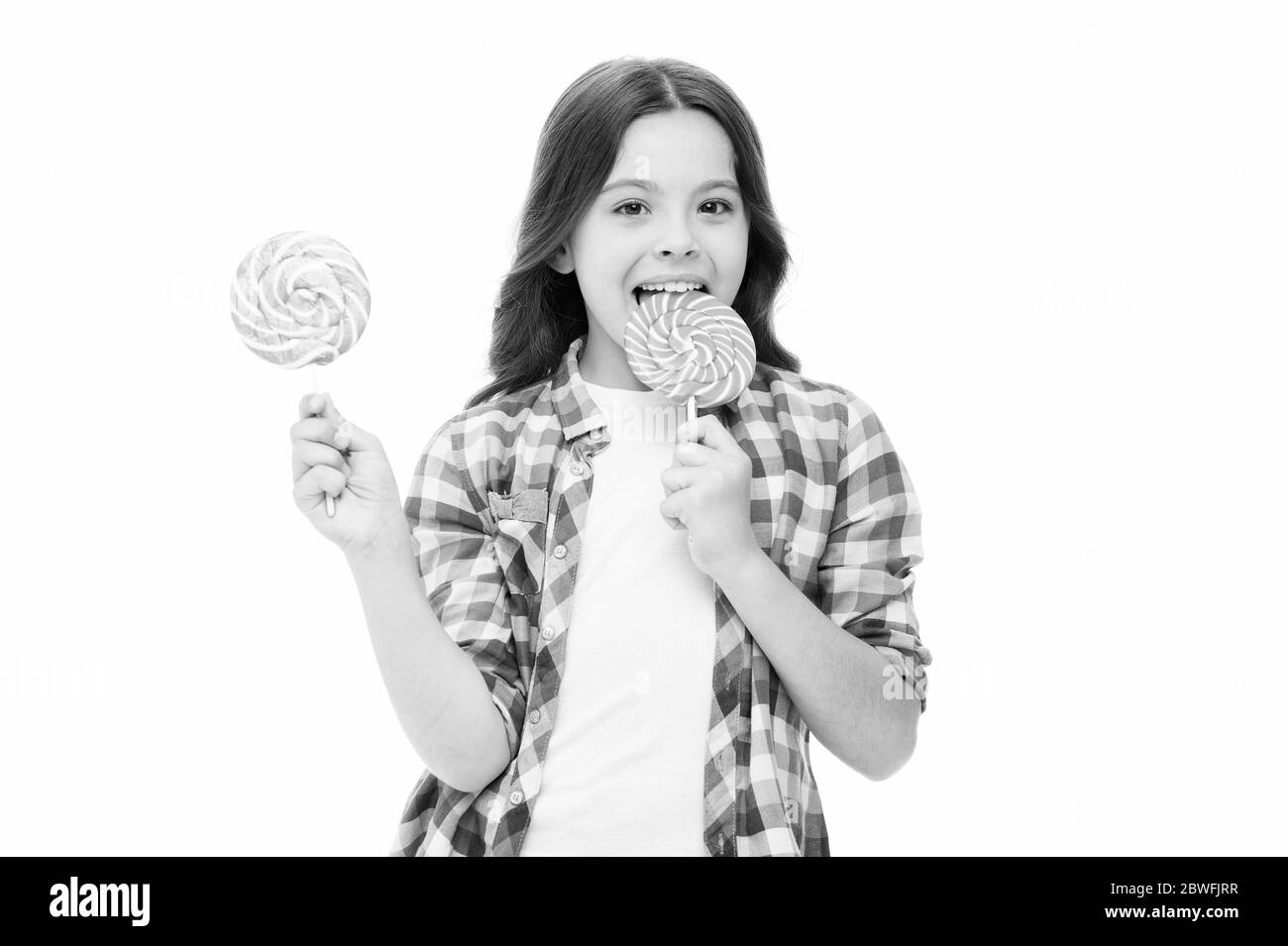 Lollipop a day helps you rest and play. Happy girl enjoy lollipop ...