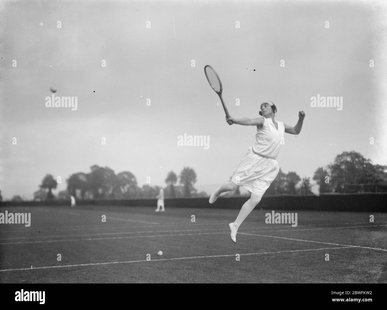 The Surbiton tennis tournament . Miss Violette Lermitte ' s graceful ...