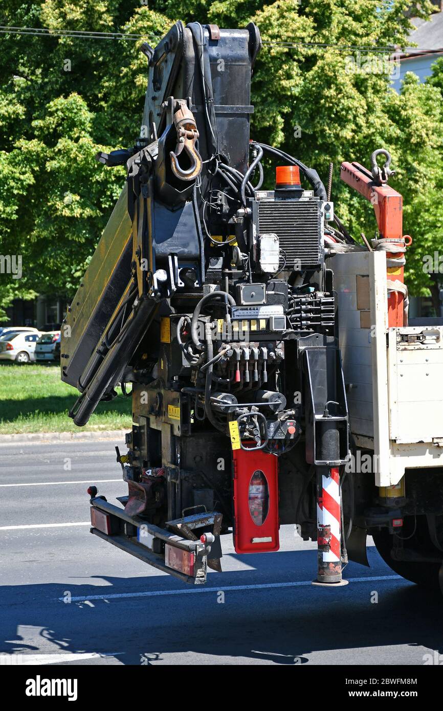 Crane on the rear side of a truck Stock Photo - Alamy