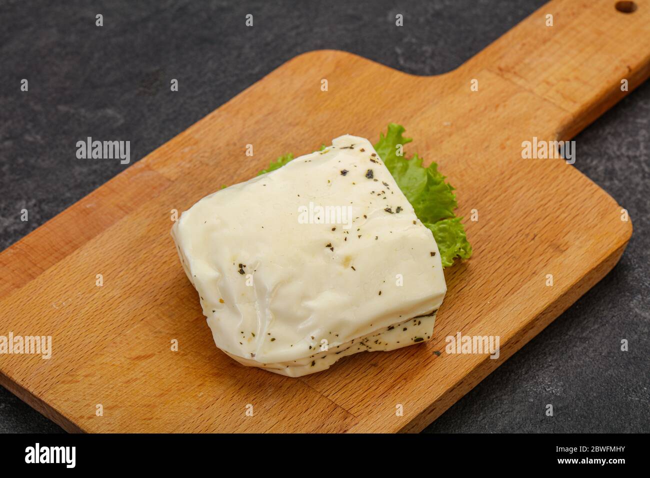 Greek Halloumi cheese with mint for grill Stock Photo - Alamy