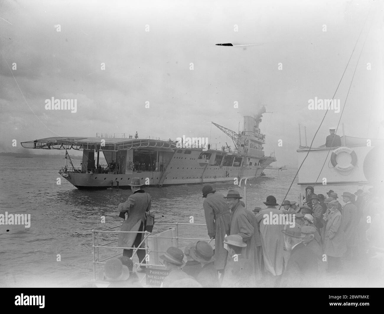 Naval review at Spithead . HMS Hermes , the famous seaplane carrier ...