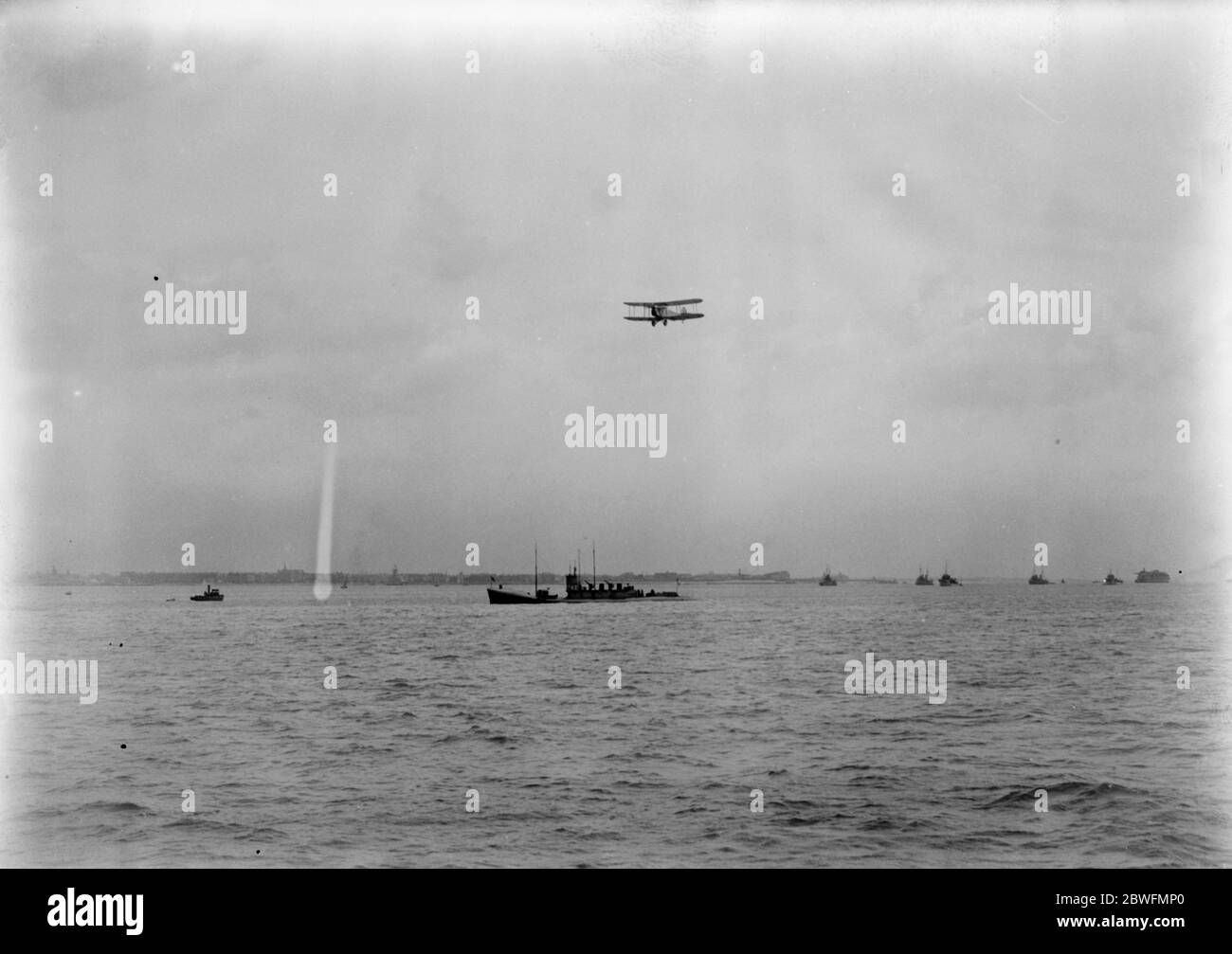 Naval review at Spithead A scouting machine over one of the sbmarines ...