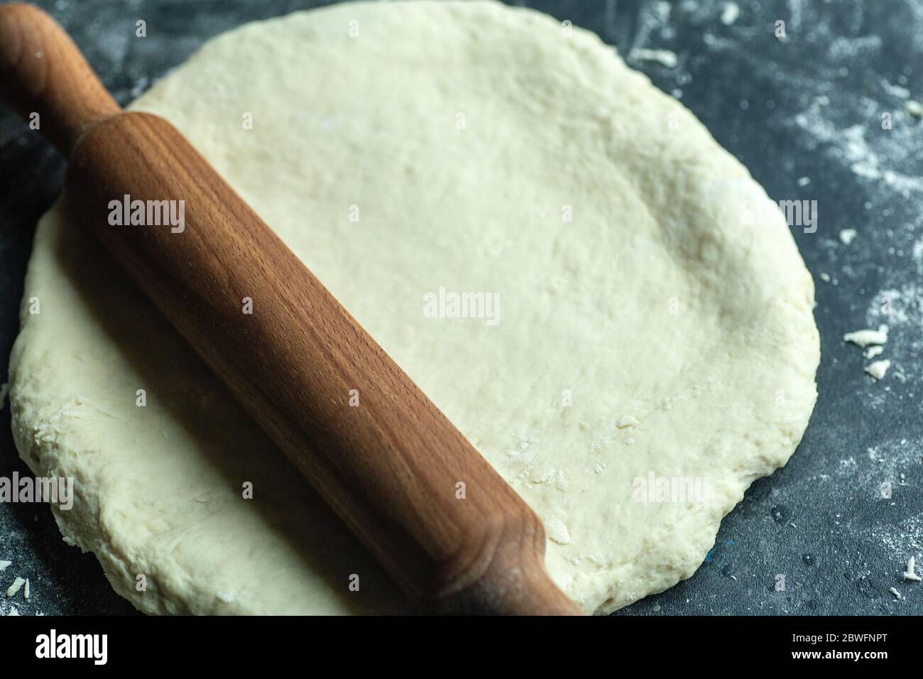 Dough pizza background. Cooking pizza dough or bread on the kitchen ...