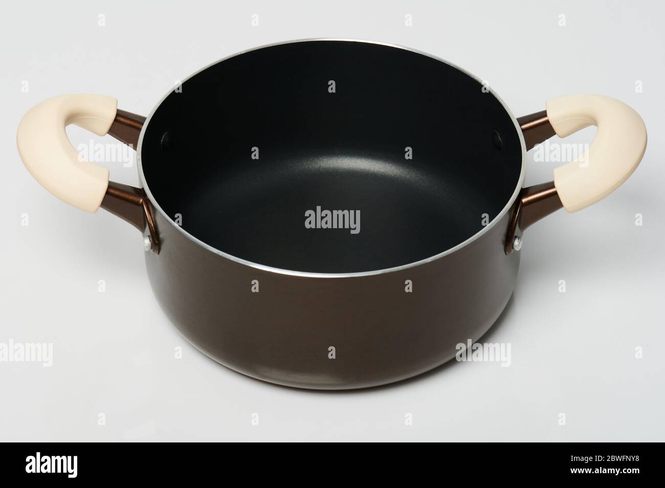 Clean empty brown cooking pot isolated on white background Stock Photo ...