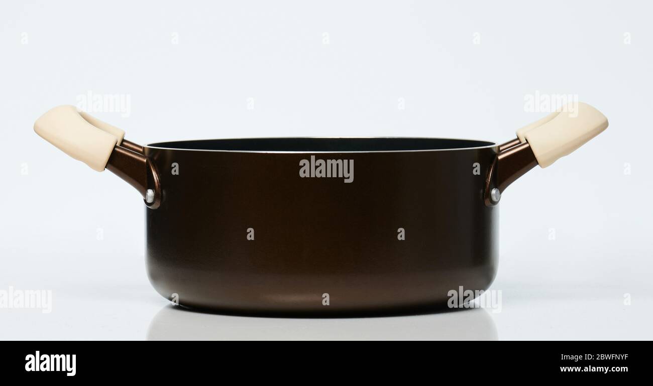 Clean brown metal pot side view isolated on white background Stock ...