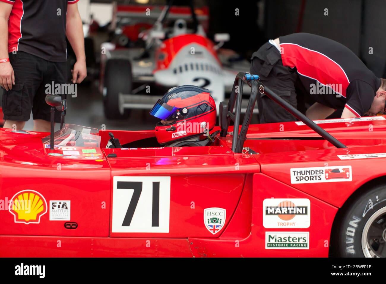 Close-up of Jonathan Mitchell, siting in the cockpit of his Red, 1971 ...