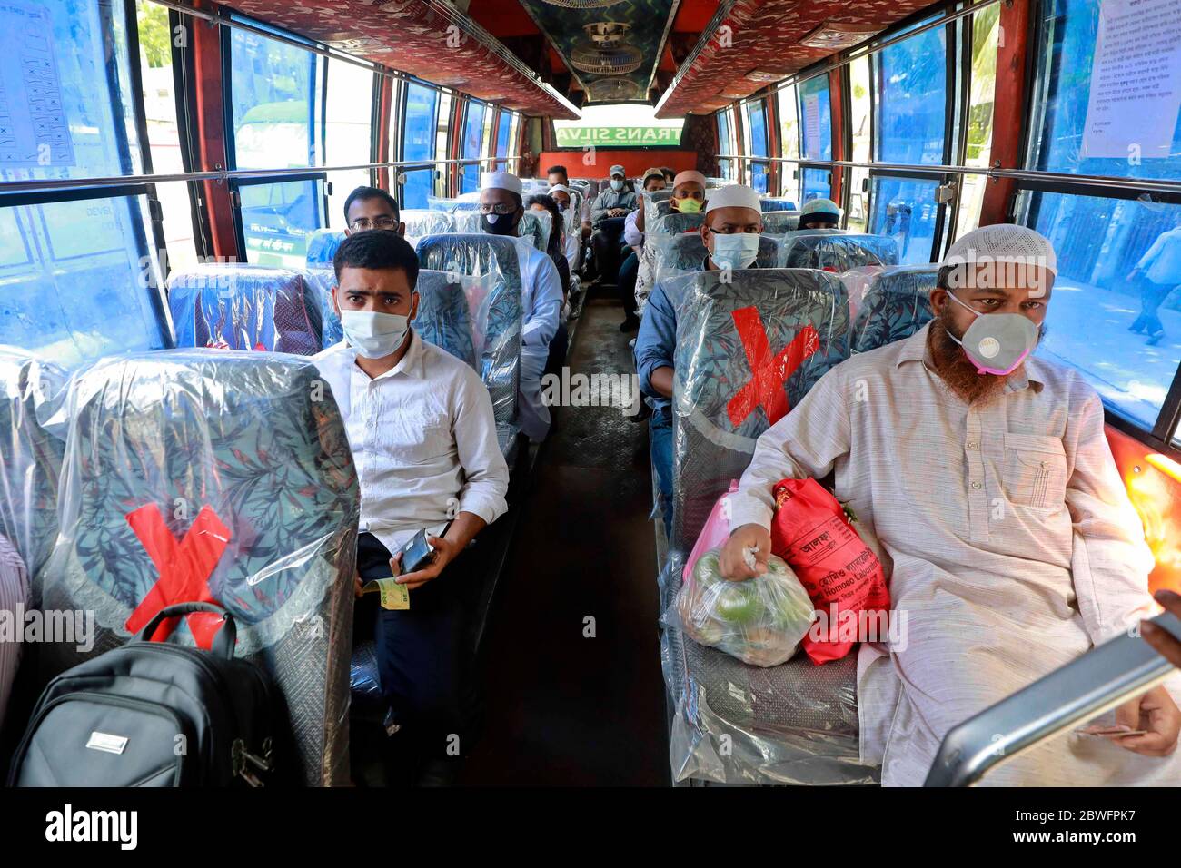 Dhaka, Bangladesh - June 01, 2020: Passengers are seen sitting inside ...