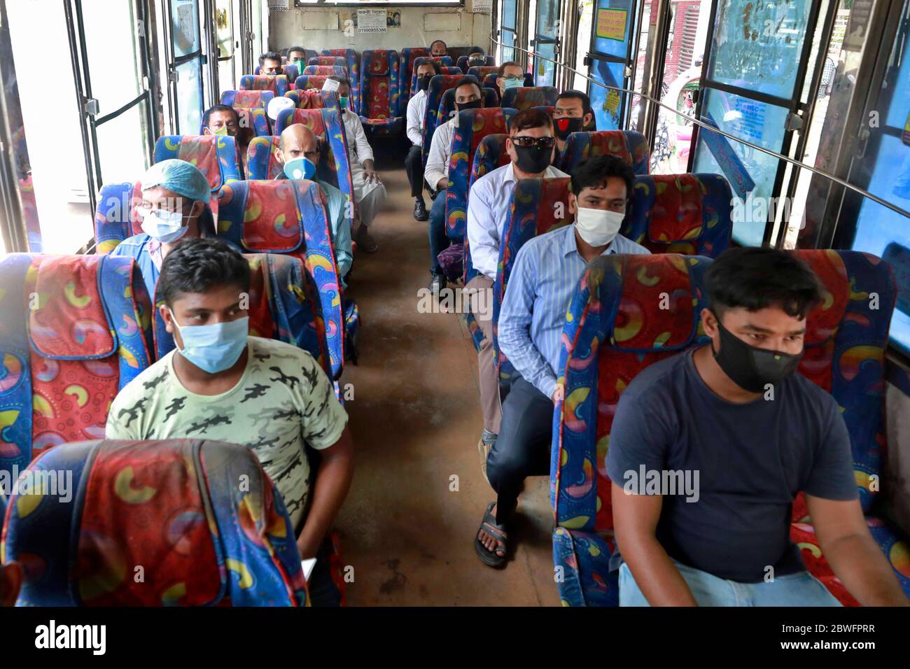 Dhaka, Bangladesh - June 01, 2020: Passengers are seen sitting inside ...