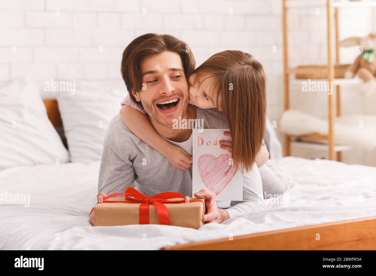 Little princess celebrating Father's Day with daddy Stock Photo - Alamy