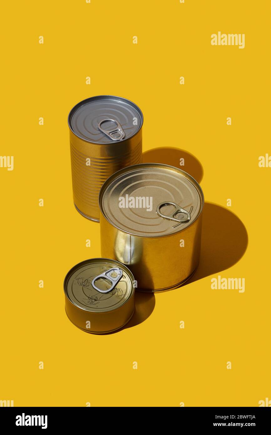 Non-perishable canned goods on colorful background. Pandemic kit staple ...