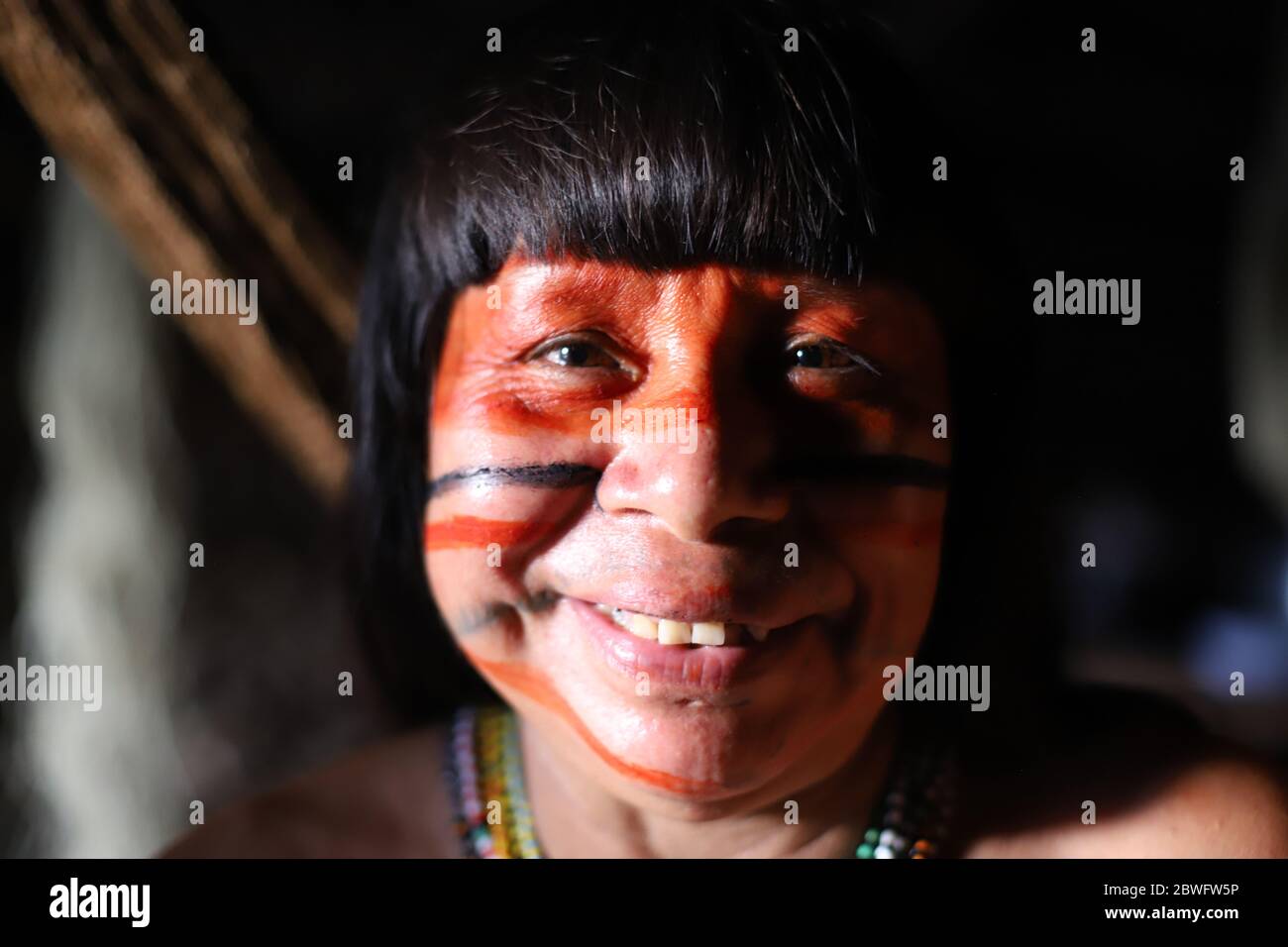 The red face paint is a source of identification and thought to bring ...