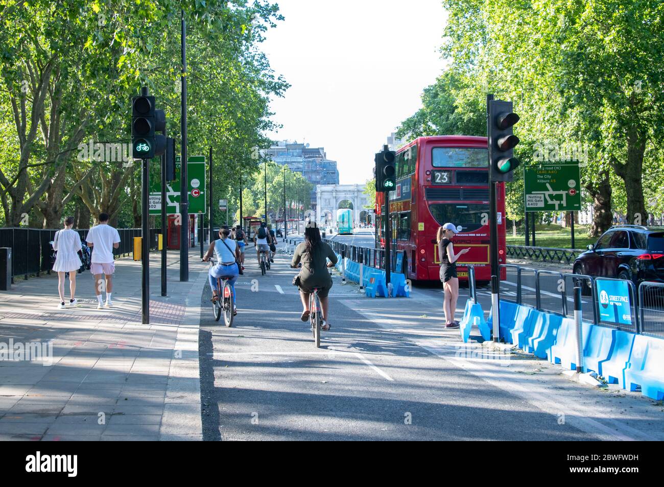 Streetspace for London, Park Lane, London W1. Cyclists use new expanded ...