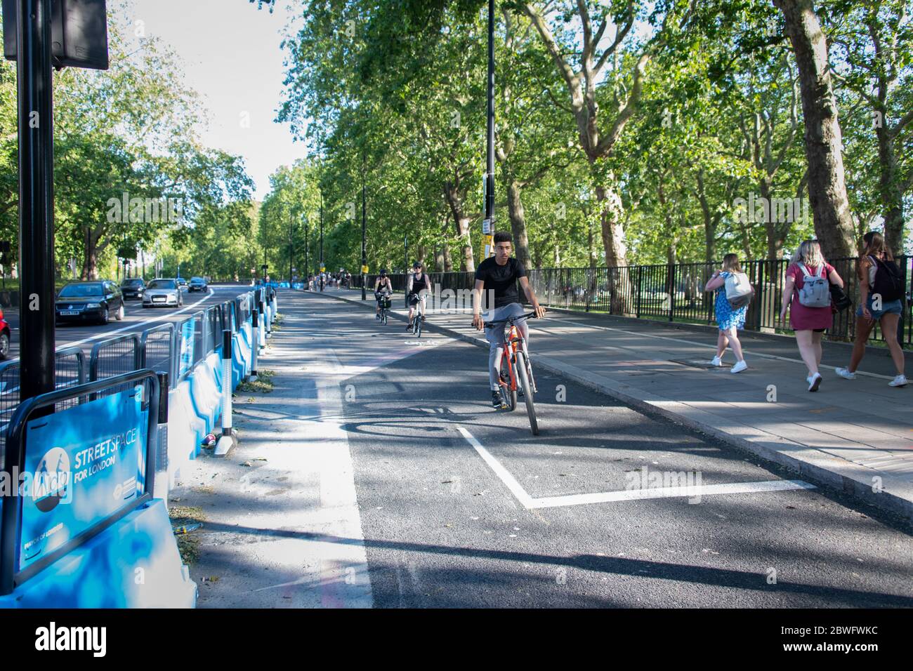 Cyclists use new cycle lane hi-res stock photography and images - Alamy