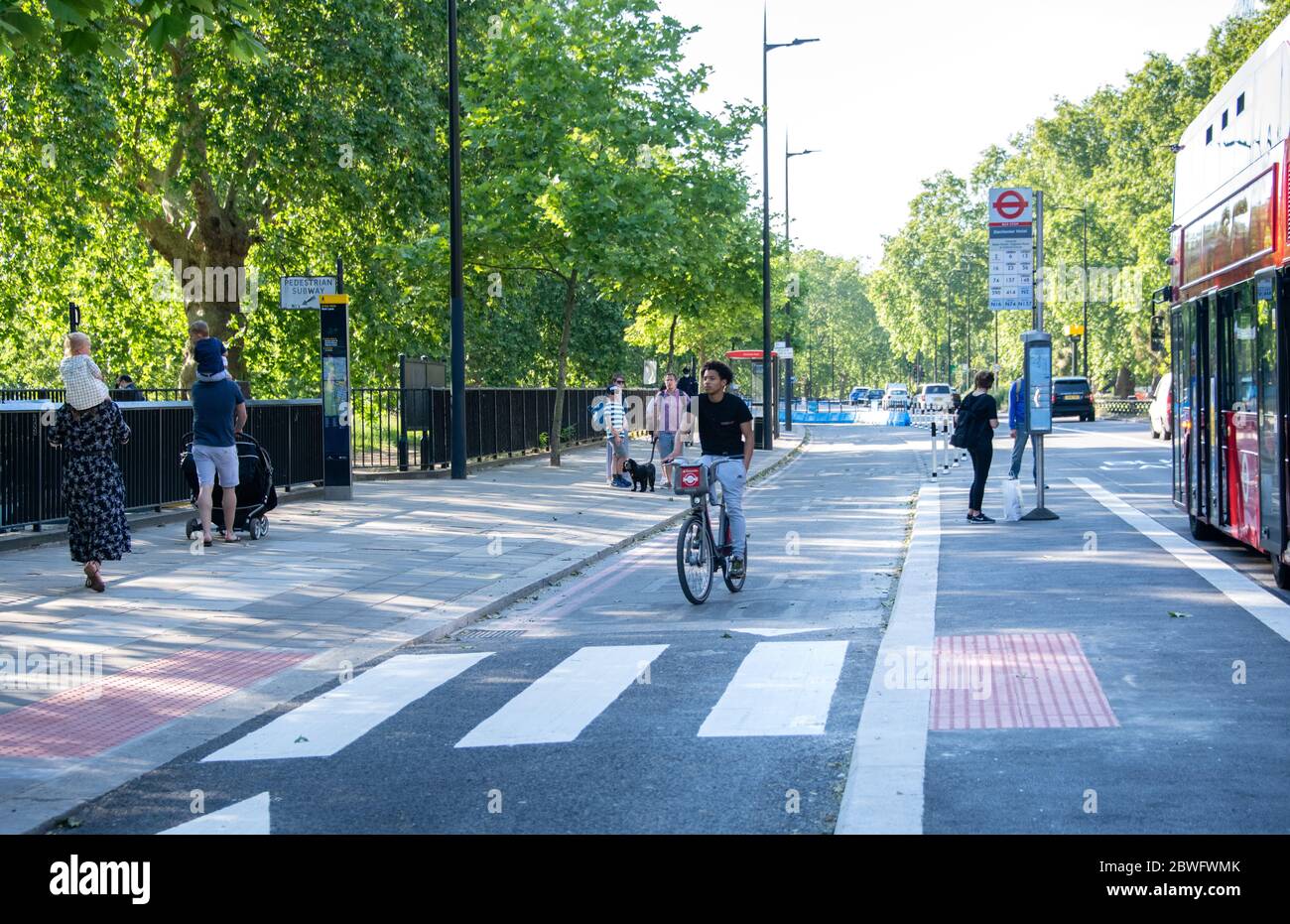 Streetspace for London, Park Lane, London W1. Cyclists use new expanded ...