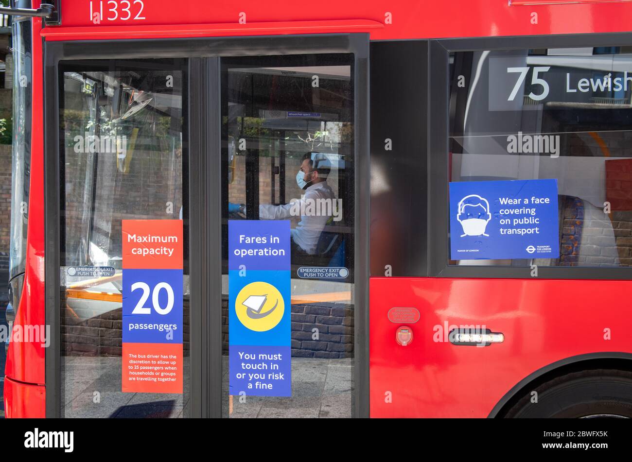 New stickers on buses remind commuters to socially distance during the ...