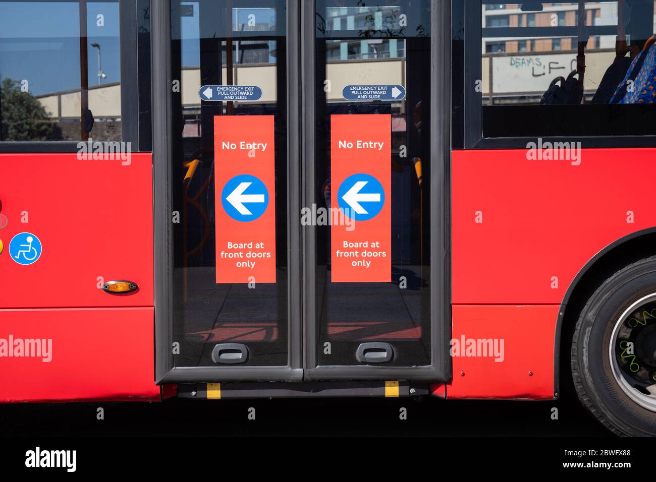 New stickers on buses remind commuters to socially distance during the ...