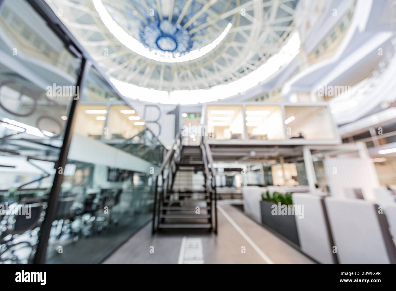 Modern open space office with high ceilings and dome Stock Photo - Alamy