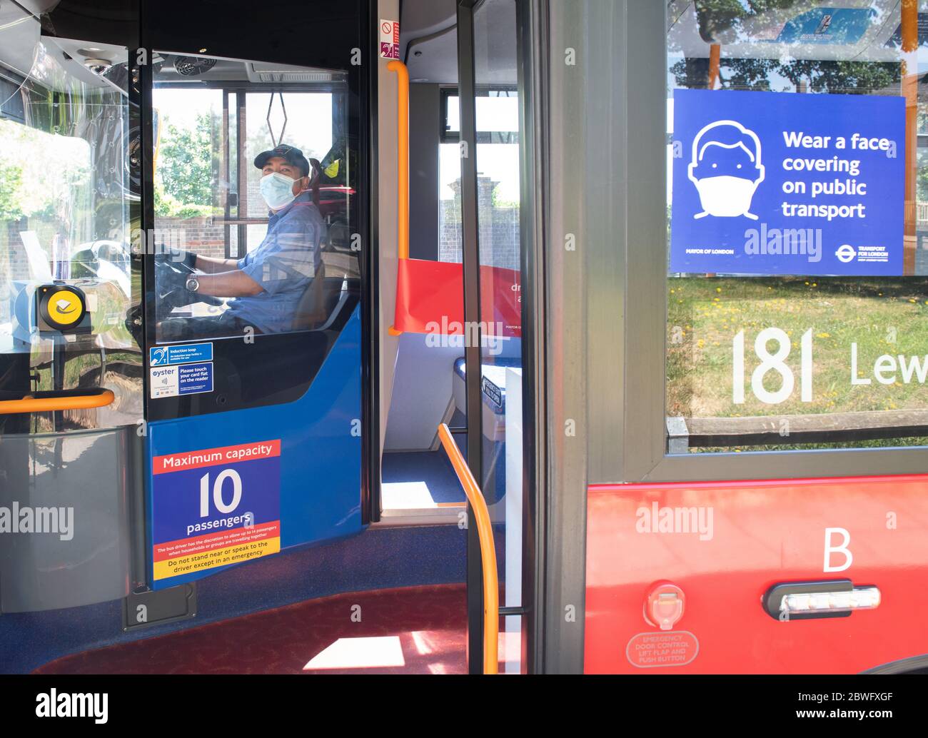 New stickers on buses remind commuters to socially distance during the ...