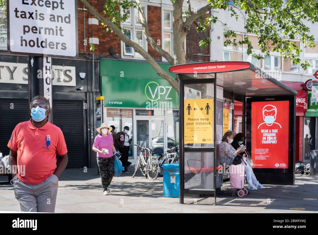 New stickers on buses remind commuters to socially distance during the ...