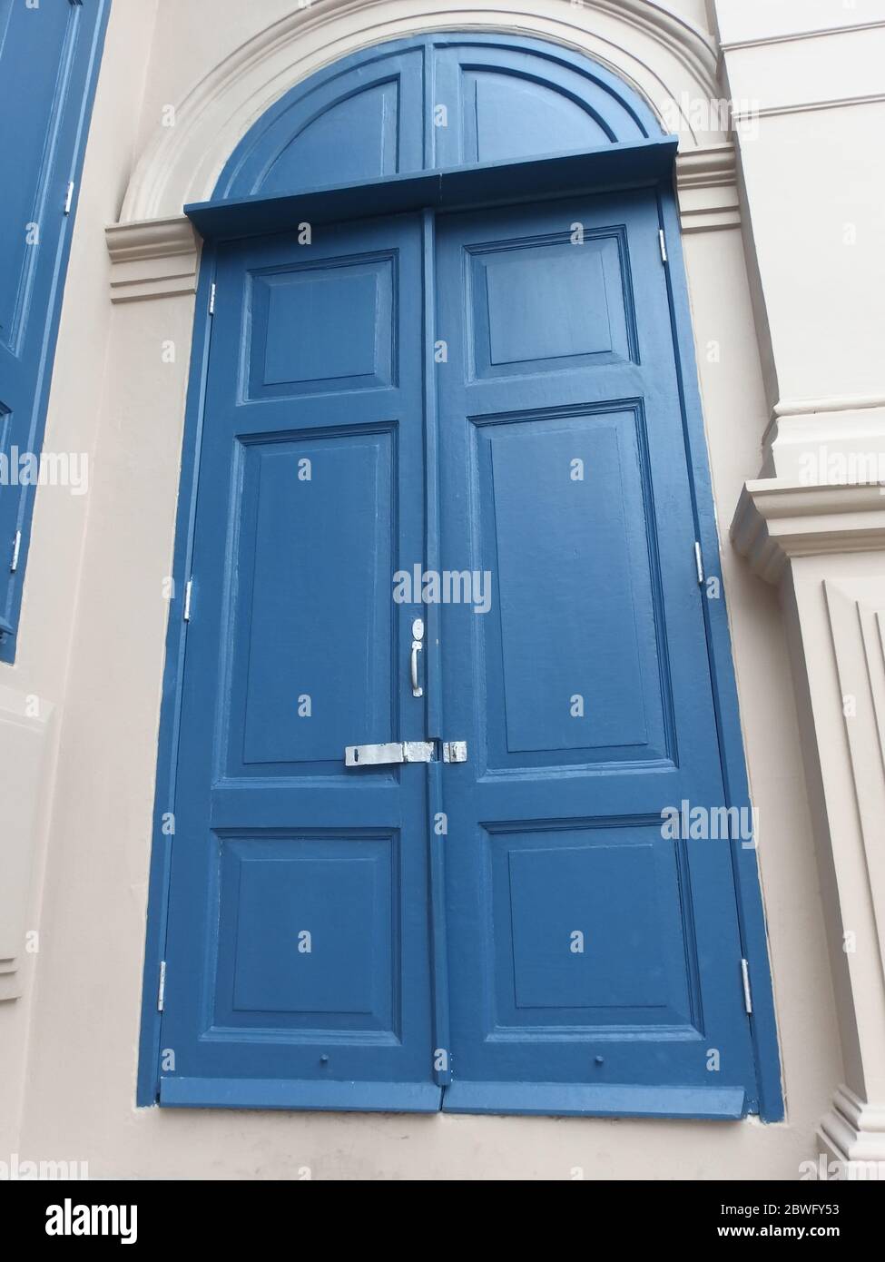 Large wooden window doors, neoclassical architecture Stock Photo - Alamy