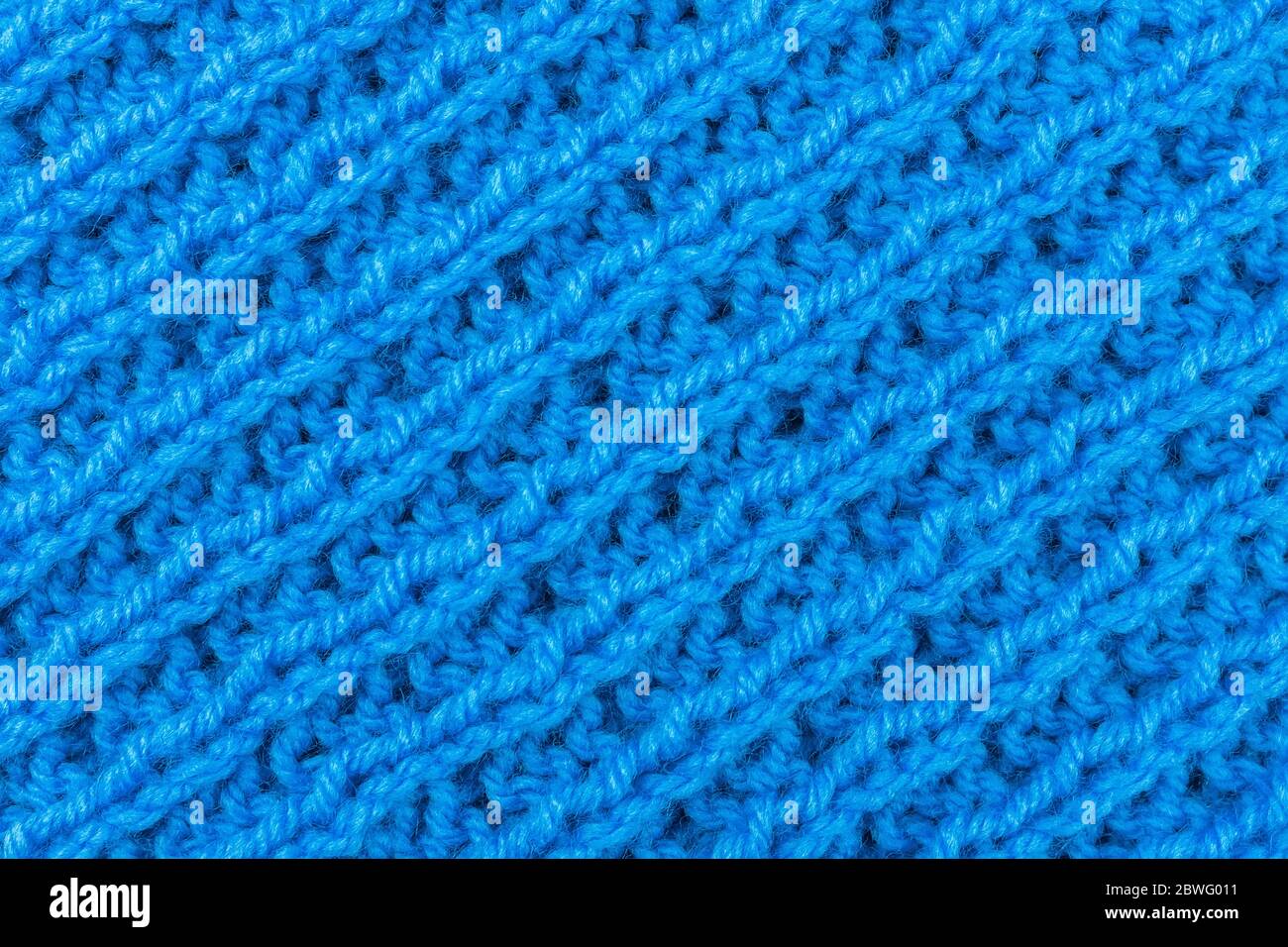 Knitted background. Knitted texture. A sample of knitting from wool ...