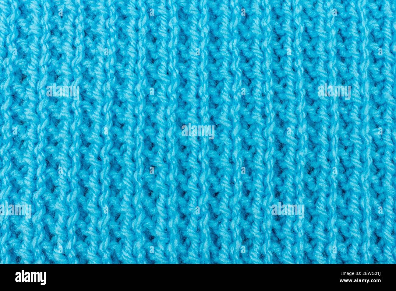 Knitted background. Knitted texture. A sample of knitting from wool ...