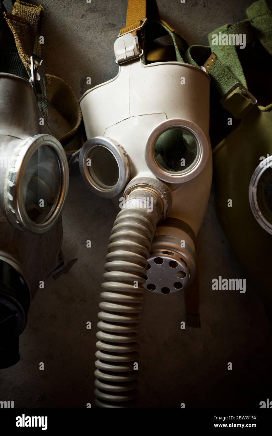 Old respiratory masks from the Cold War era, hanging in a wall Stock ...
