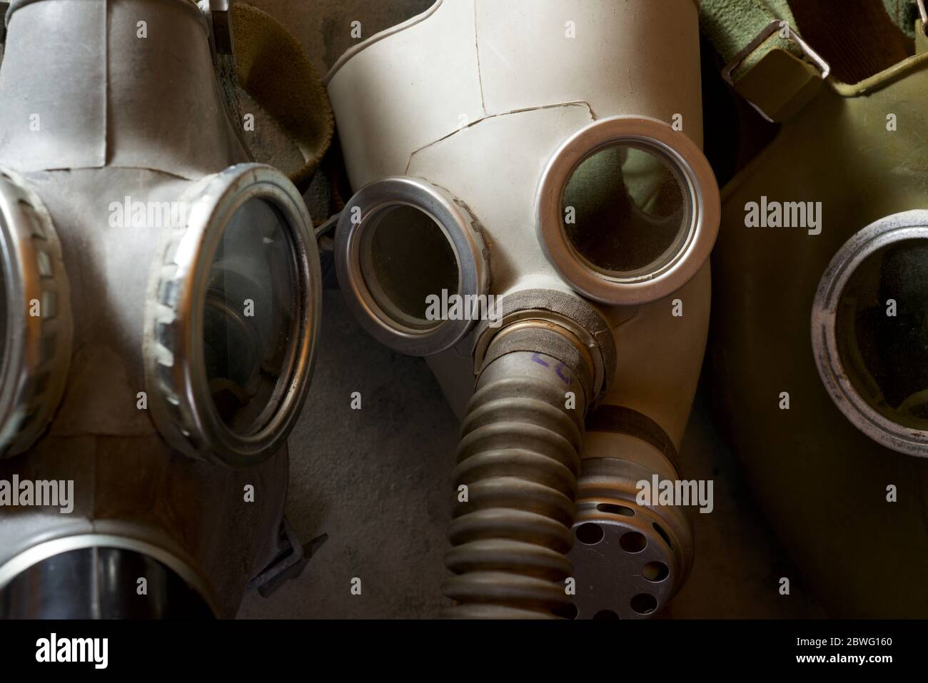 Old respiratory masks from the Cold War era, hanging in a wall Stock ...