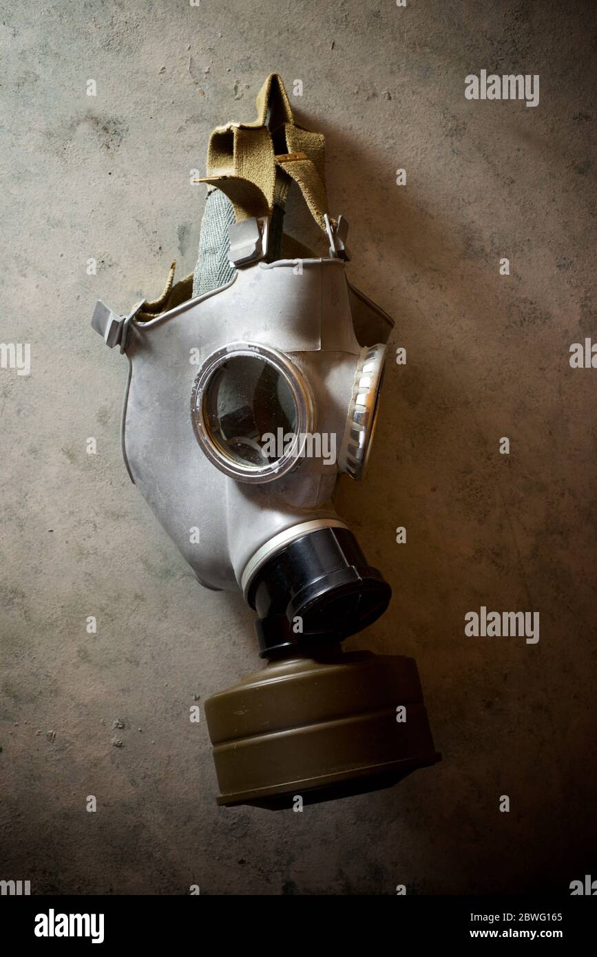Old respiratory mask from the Cold War era, hanging in a wall Stock ...