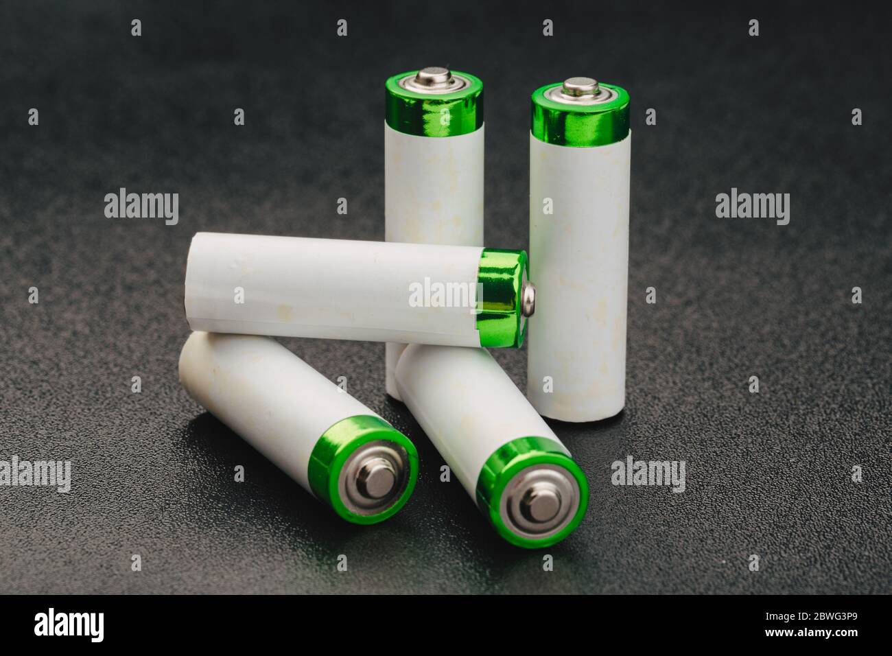 close up of battery positive poles on black backgrounds. intended ...