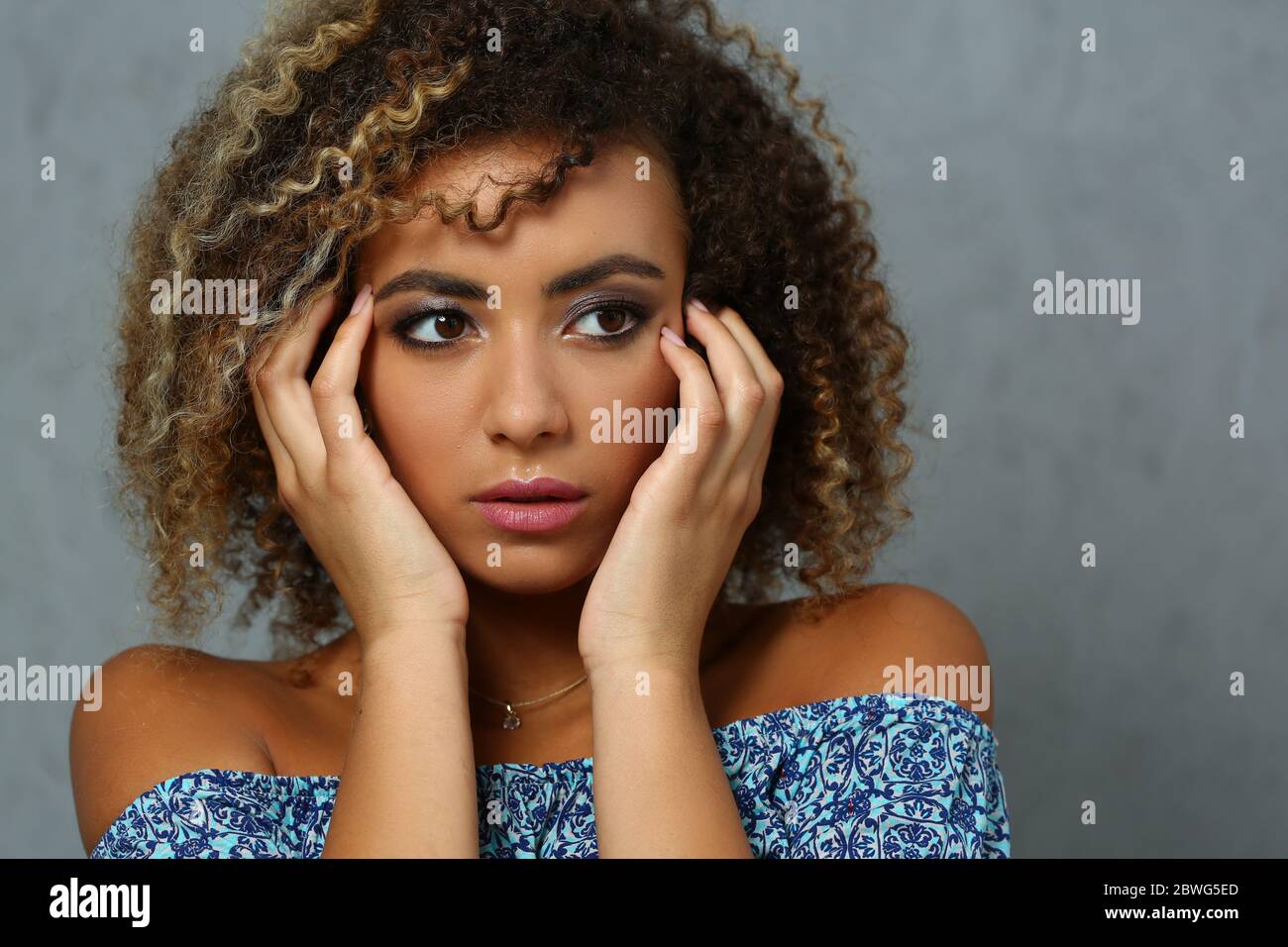 Close up of emotional female that touching her face Stock Photo - Alamy