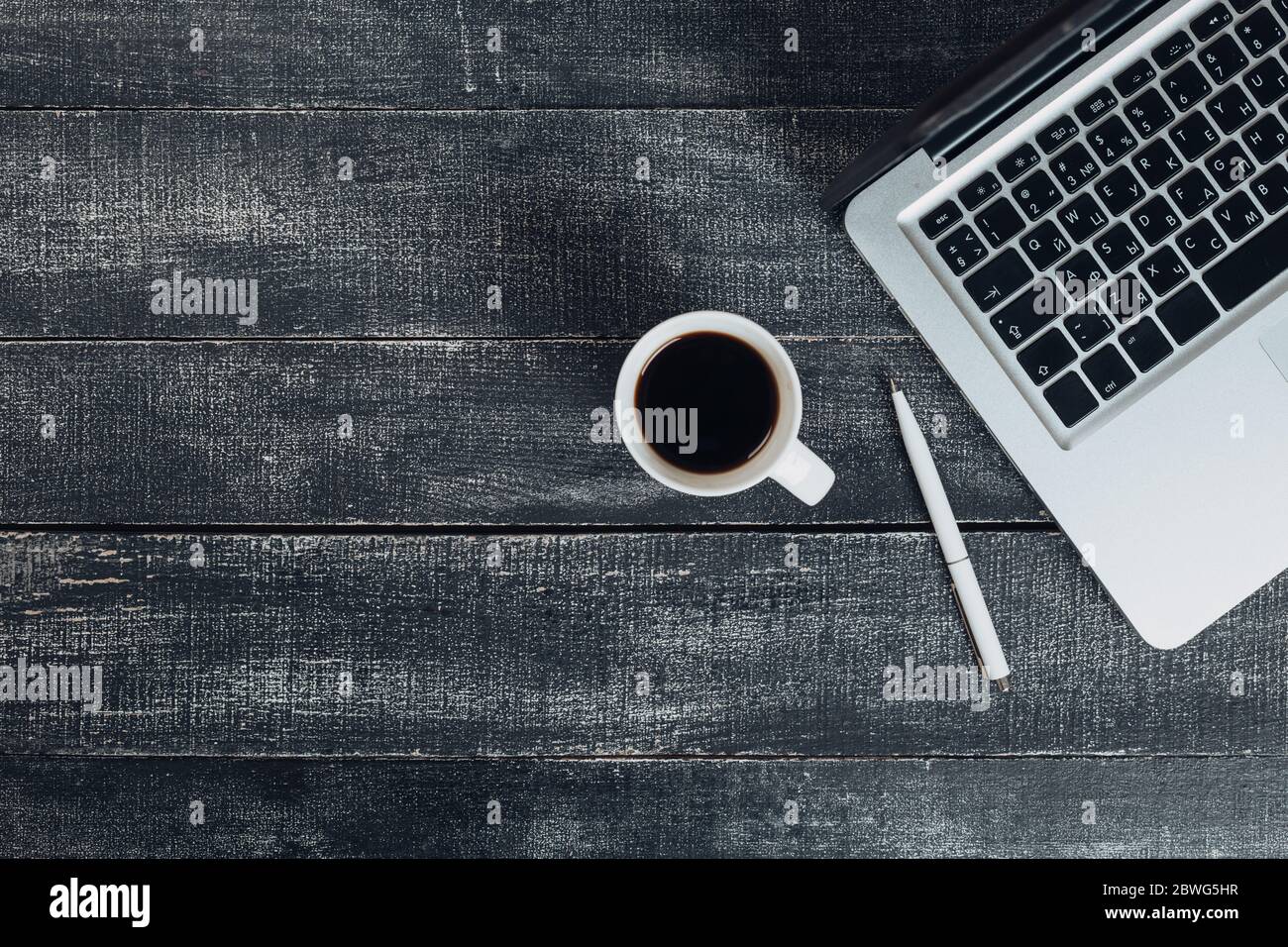 office stuff with notepad, laptop and coffee cup mouse notepad top view ...
