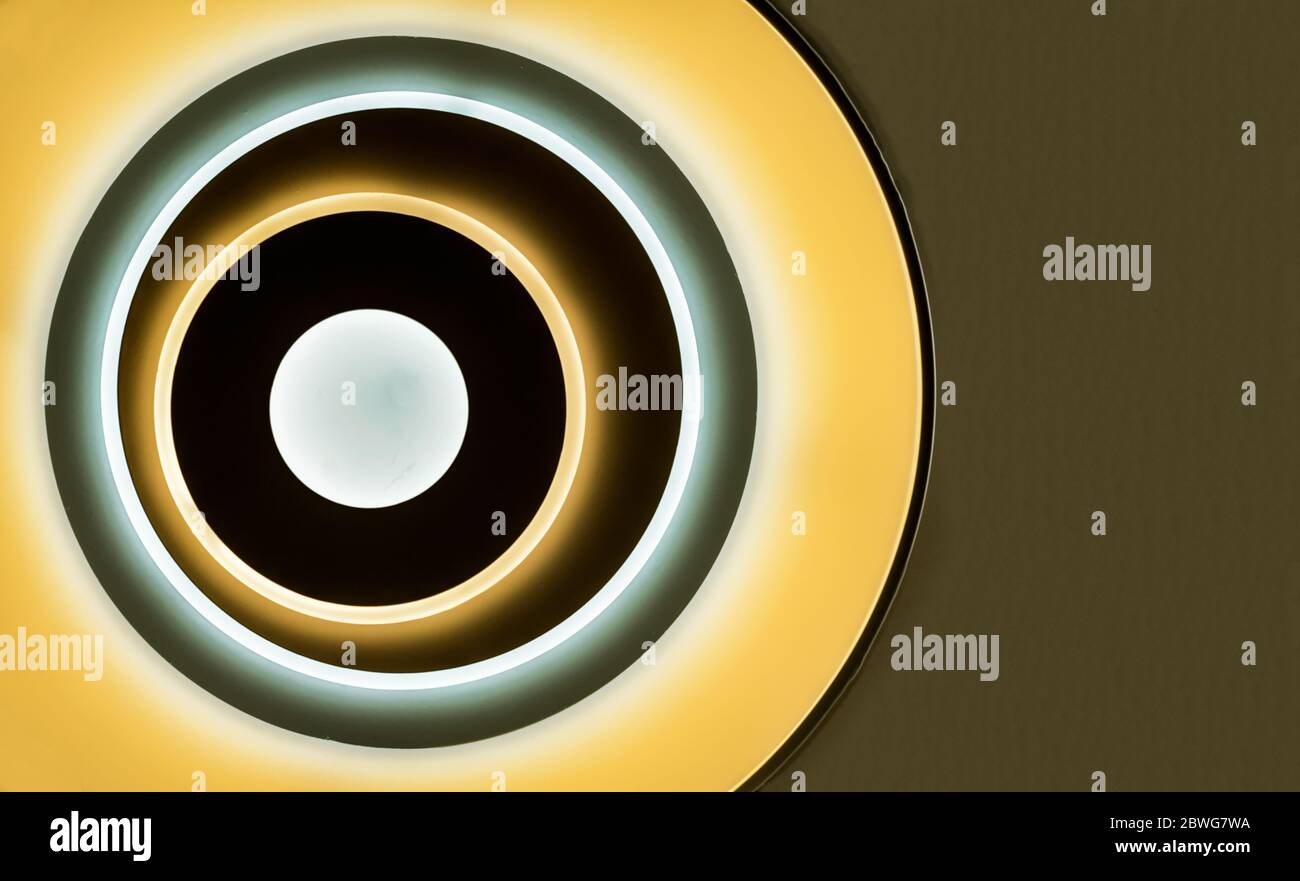 Round LED lamp with multi-colored backlight. 3D lamp Stock Photo - Alamy